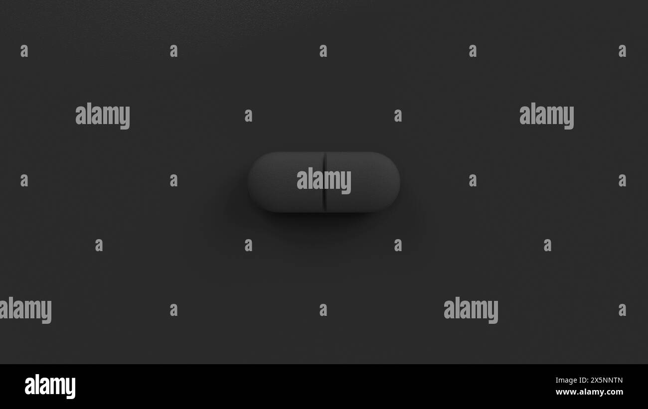 Black single pill isolated on a black background. Tablet, pill top view ...