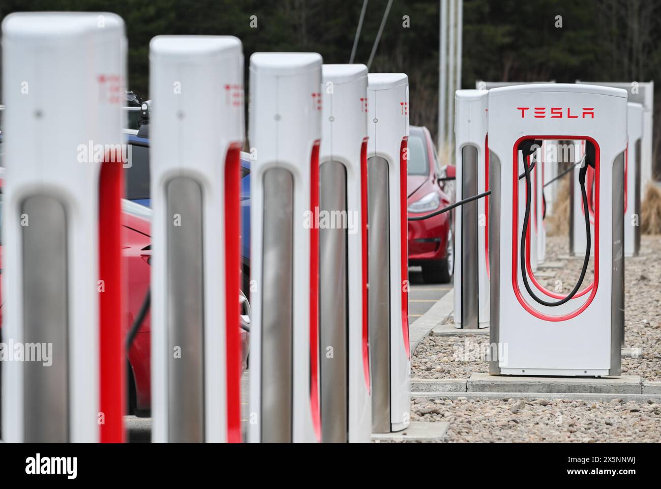 Tesla charging cables hi-res stock photography and images - Alamy