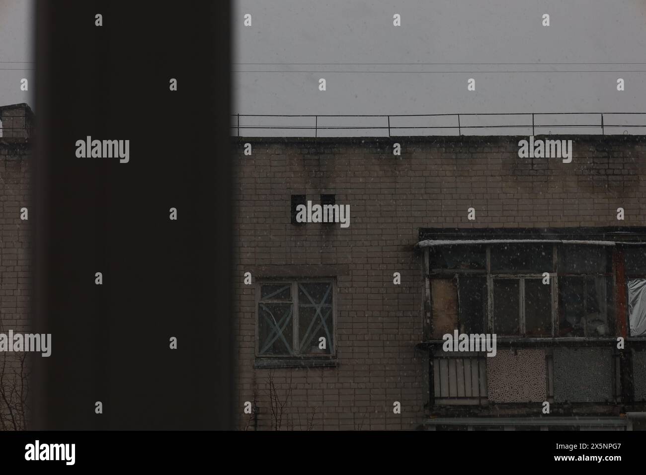 Broken windows, destroyed building, winter day, first snow, First snow ...