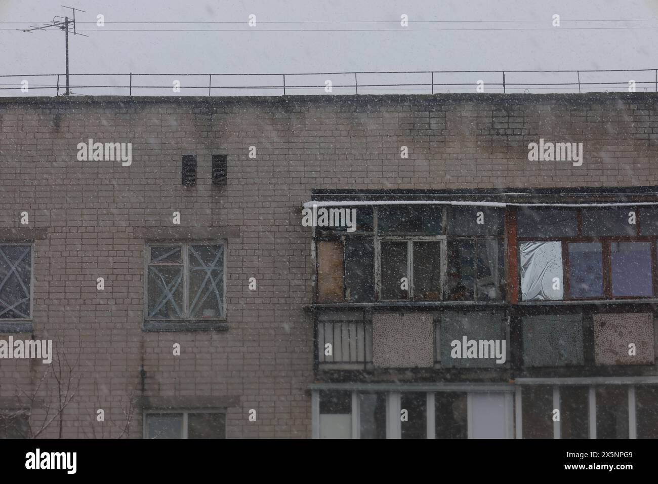 Broken windows, destroyed building, winter day, first snow, First snow ...