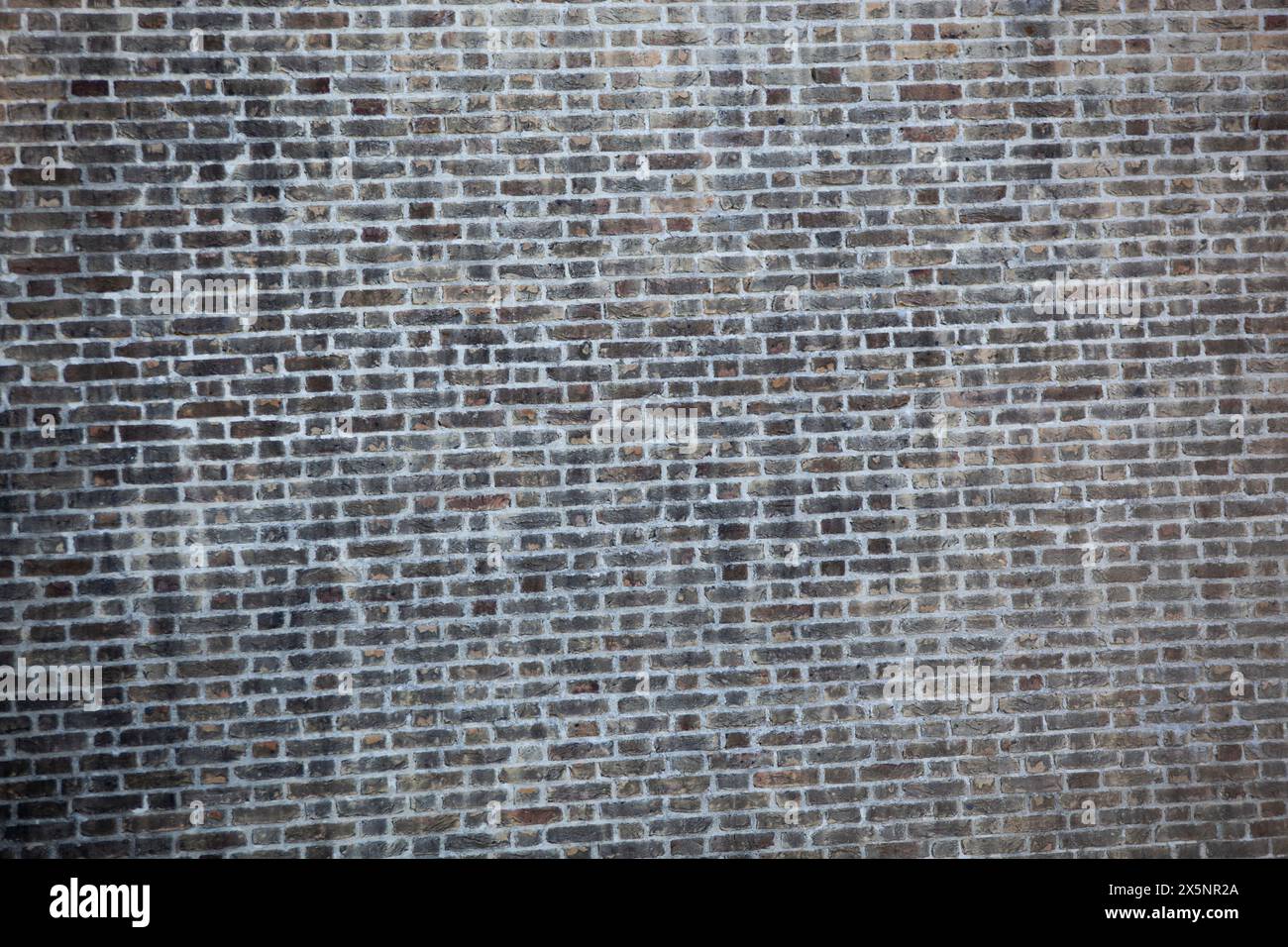Stone texture in Lithuania. An ancient wall of stones in grey colour ...