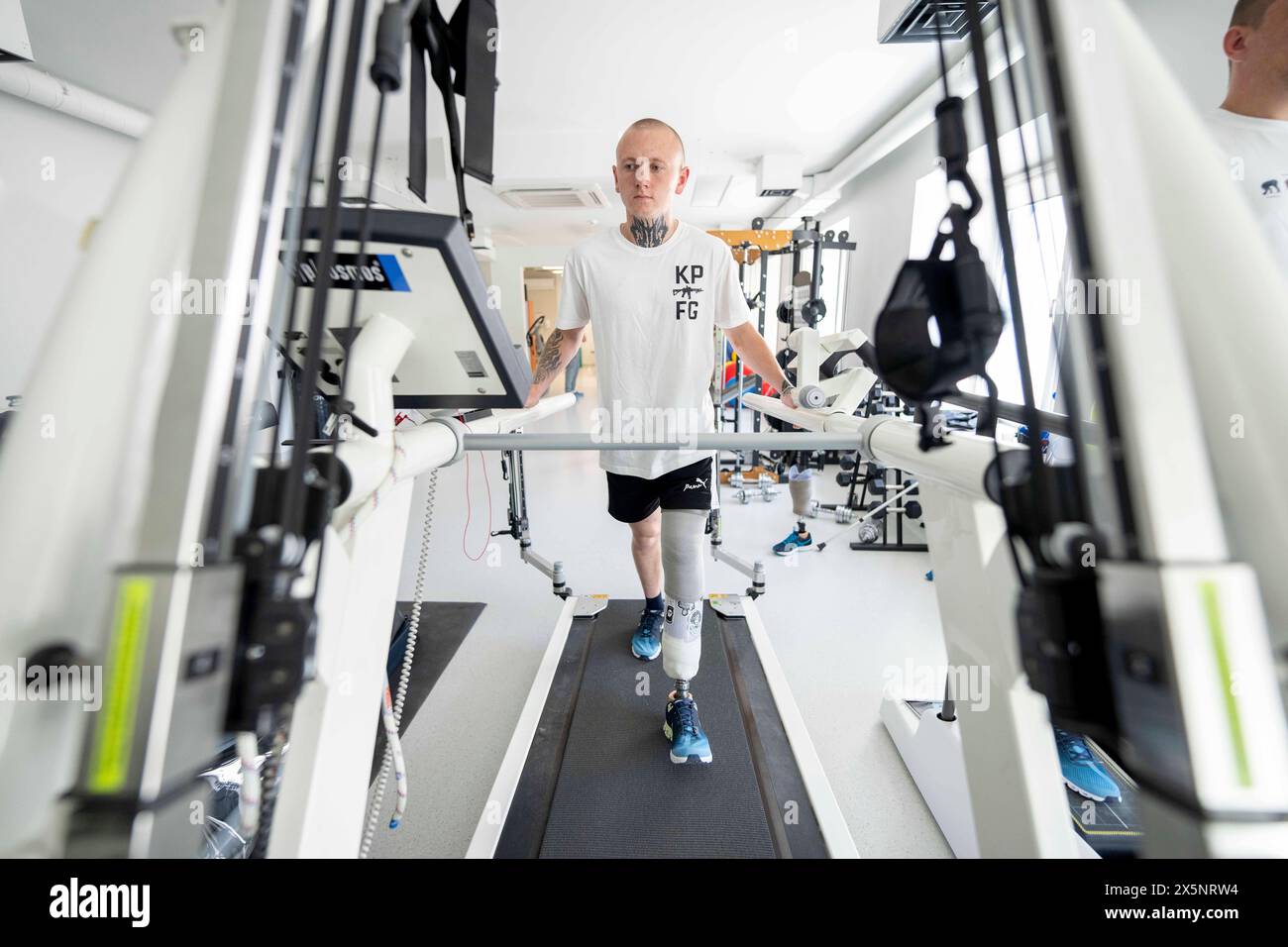 Man training with his prosthetic leg at the Superhumans Center in Lviv ...
