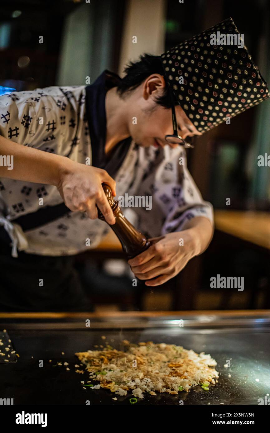 Berlin, Germany 05. 09. 2019. Teppanyaki chef cooking at teppan in a ...