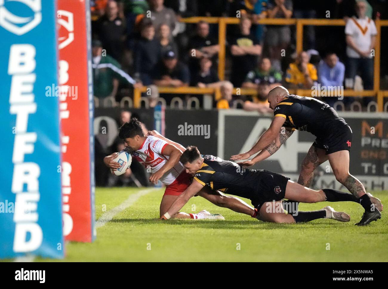 St Helens' James Bell scores a try during the Betfred Super League ...