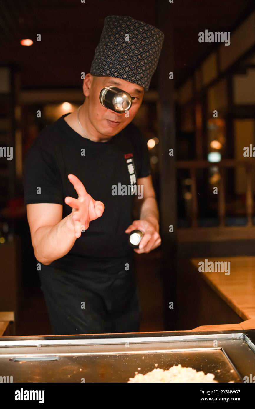 Berlin, Germany 08. 16. 2023. Teppanyaki chef cooking at teppan in a ...