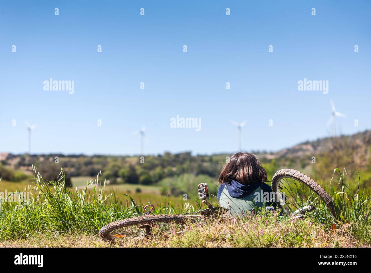 Boy riding bicycle wind hi-res stock photography and images - Alamy