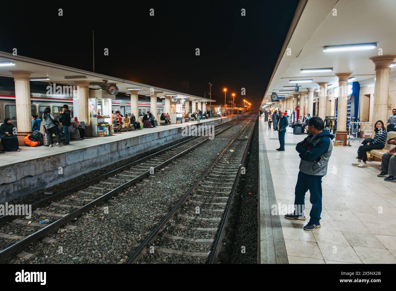 Passengers wait on the platform at Luxor Railway Station, Egypt, at ...