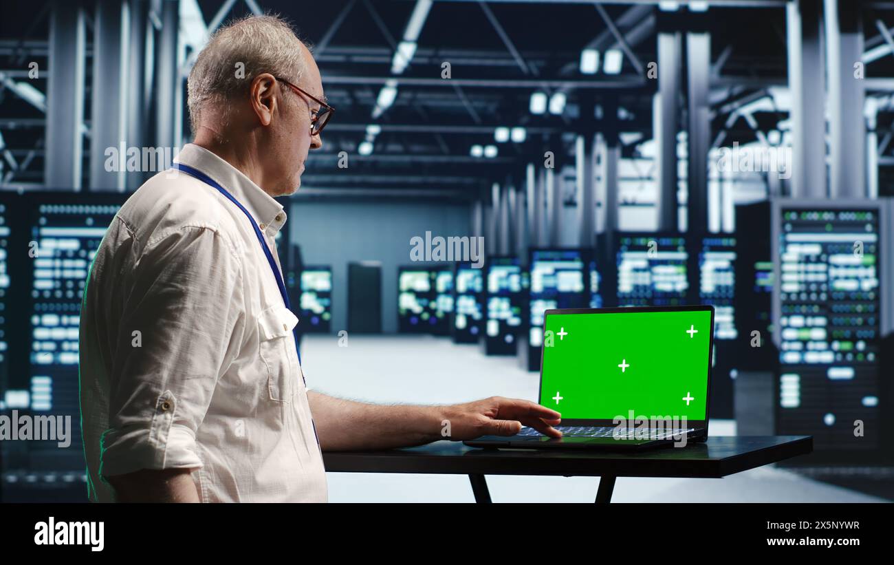 Developer in server room expertly managing data while navigating ...