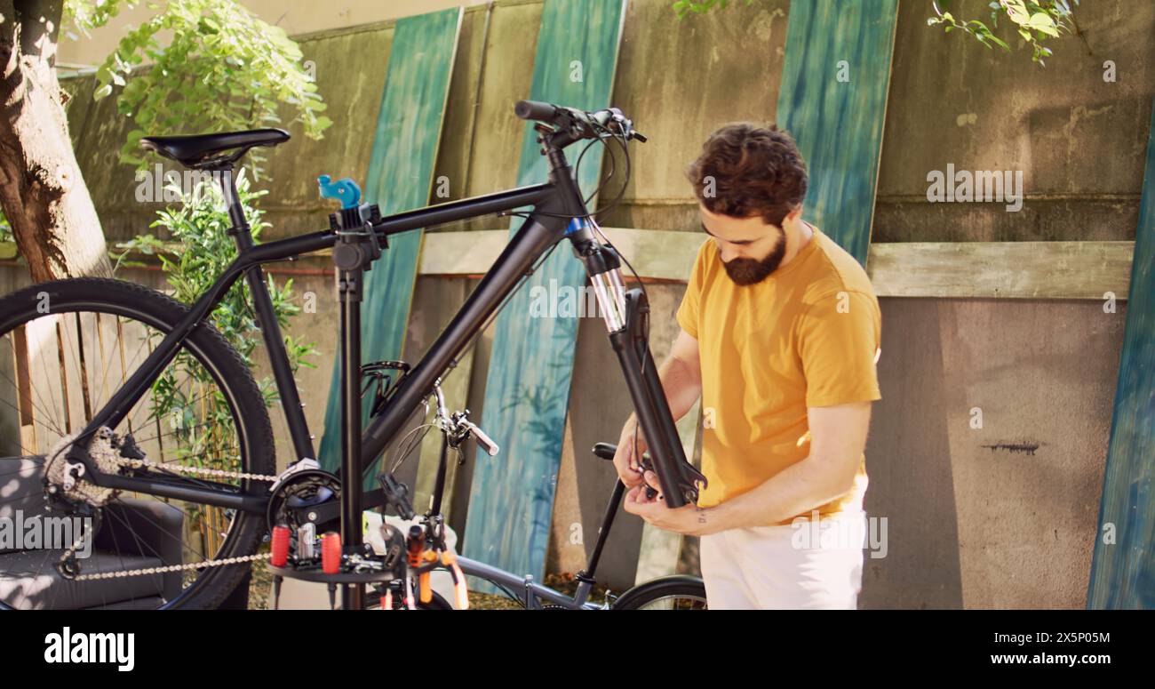 Person dismantling damaged bicycle wheel hi-res stock photography and ...