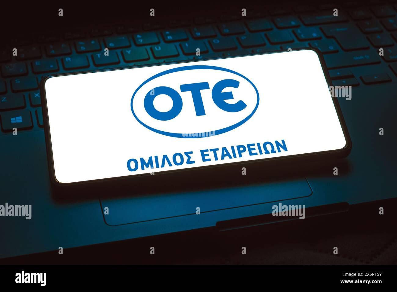 In this photo illustration, the OTE Telecom logo is displayed on a ...