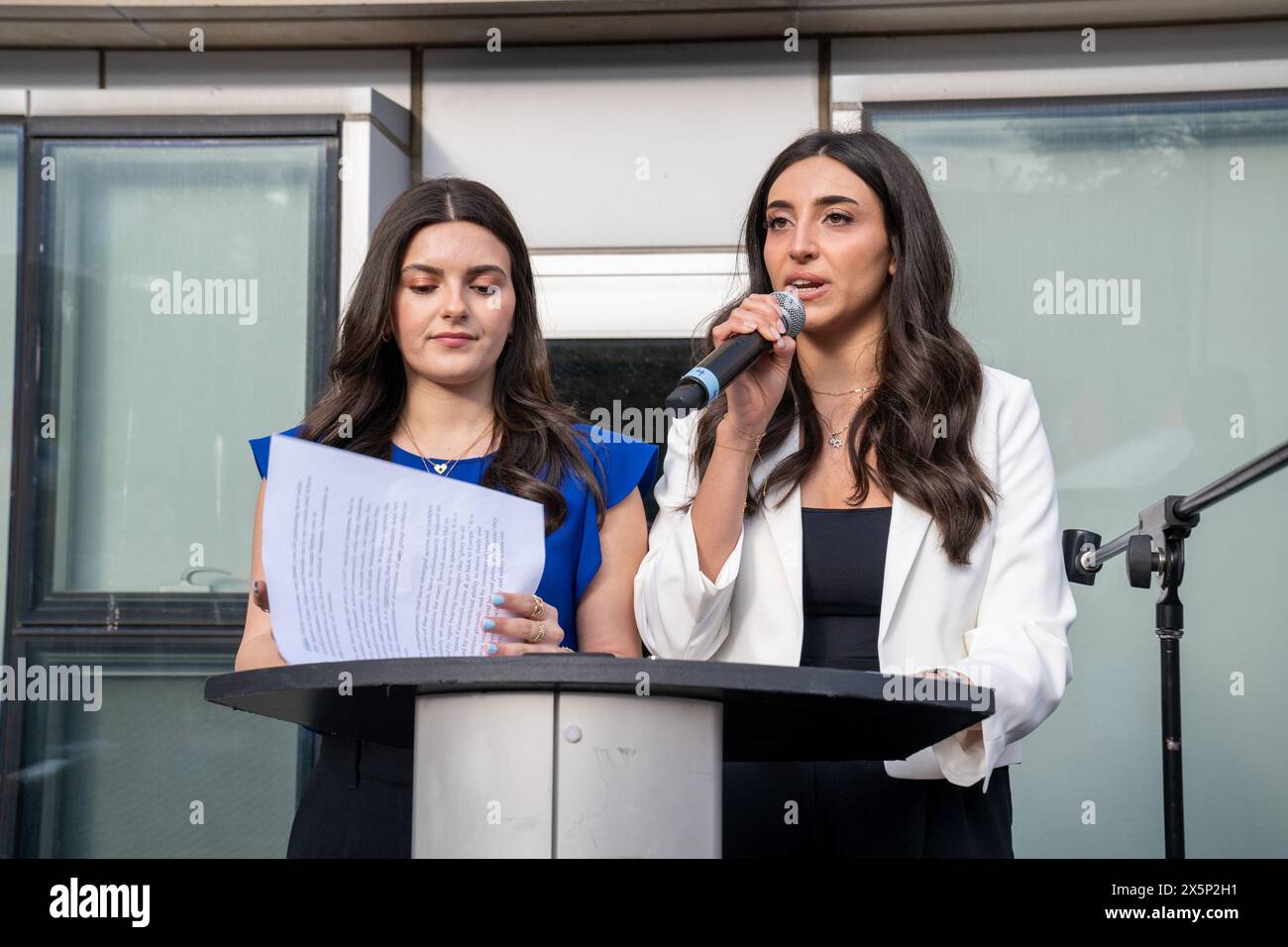 Students Eden Marco and Kayla Saul speak during the rally against hate ...