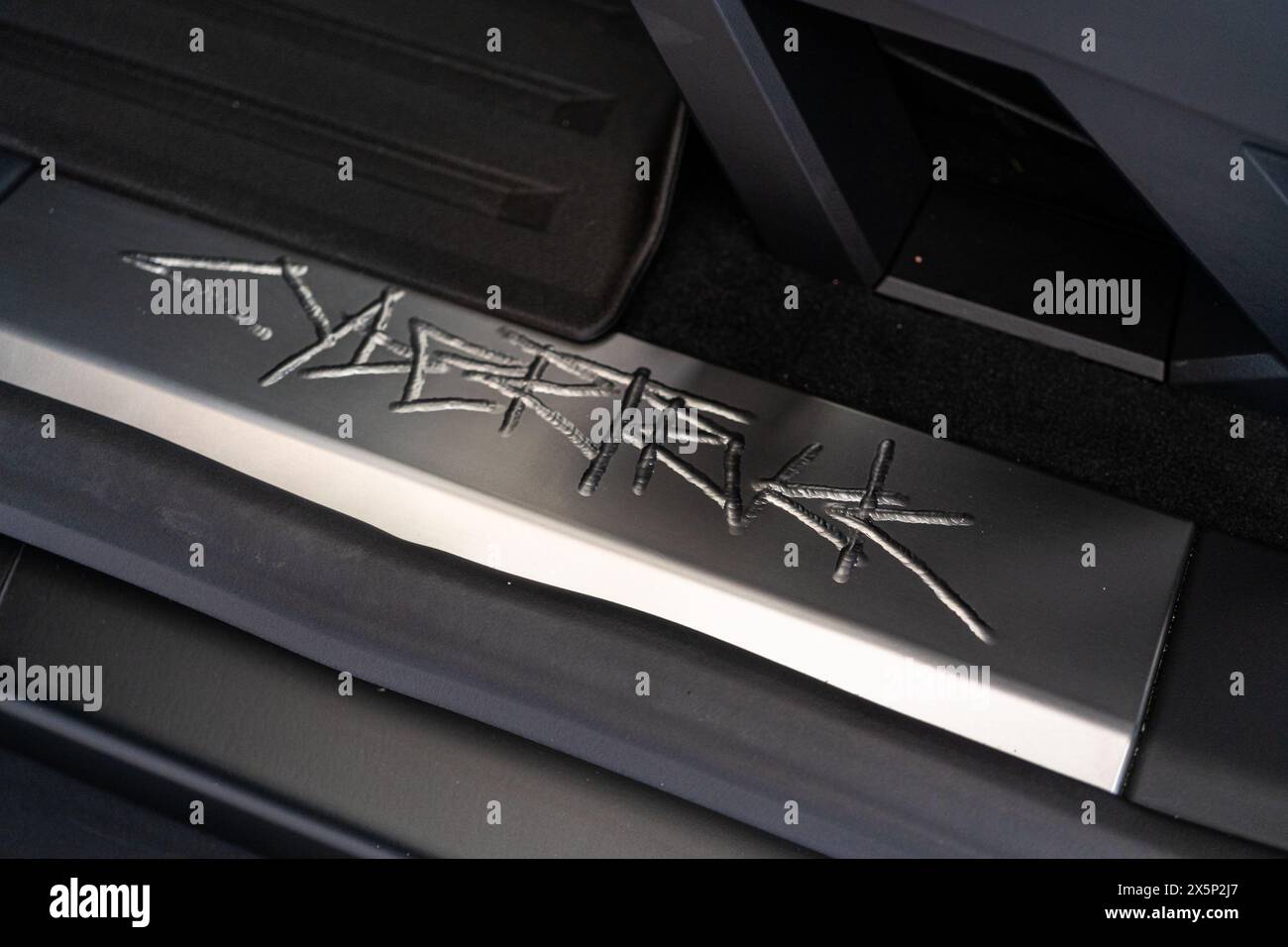 Close-Up of Tesla Cybertruck Signature Metal Engraving Stock Photo - Alamy