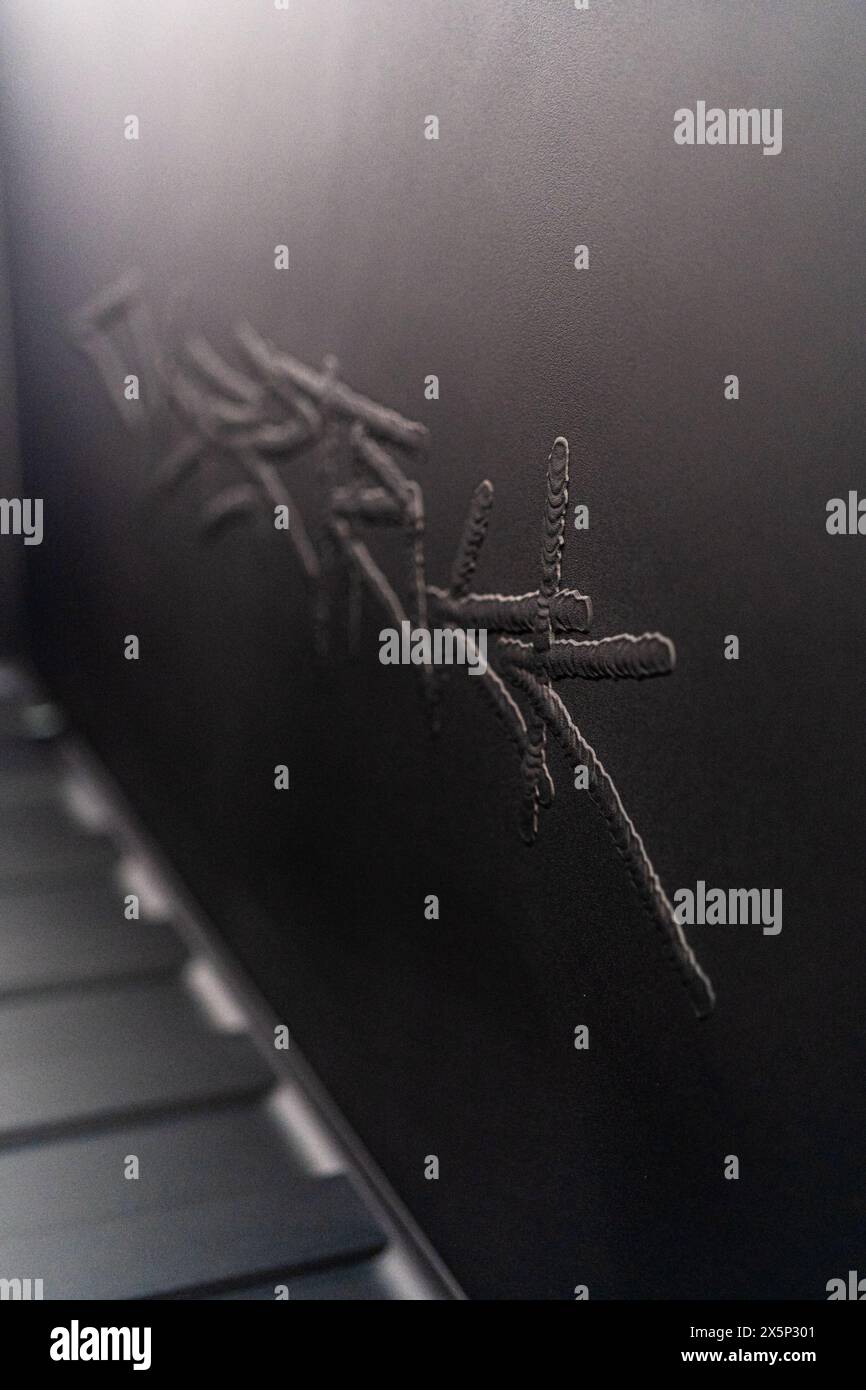 Engraved Logo Detail Inside the Open Frunk of a Tesla Cybertruck Stock ...