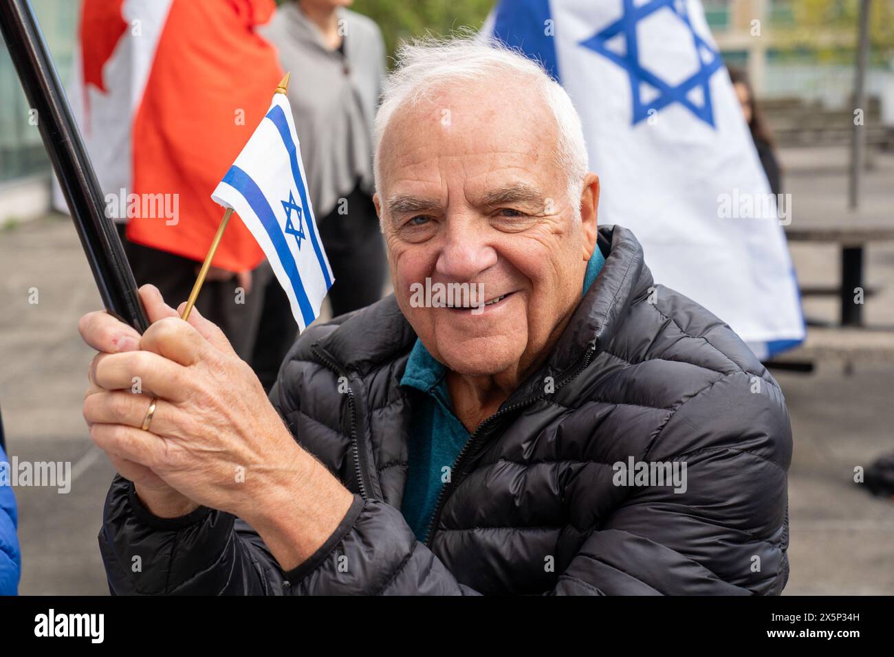 May 5, 2024, Toronto, Ontario, Canada: An old man holds Canada and ...