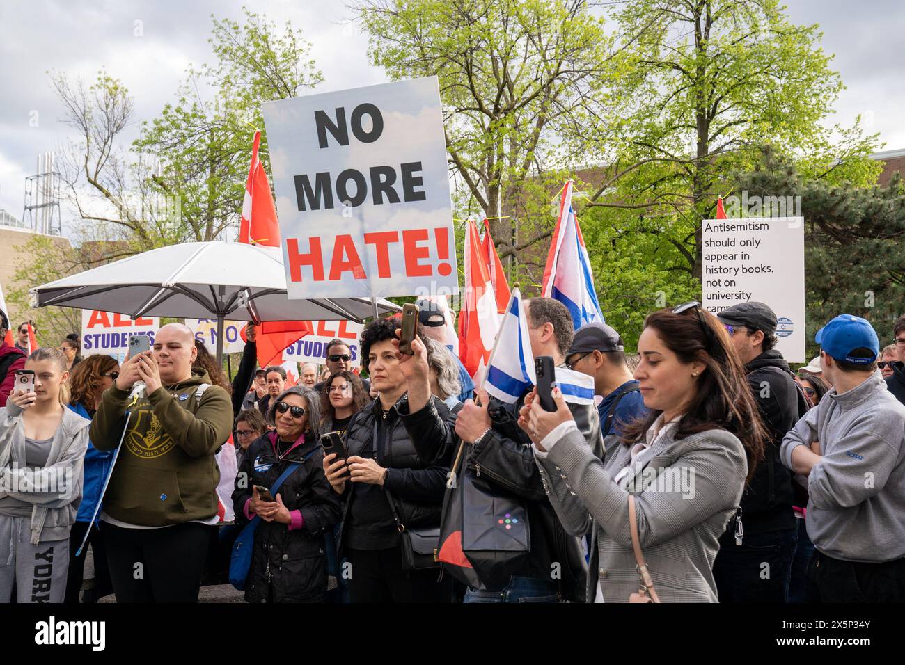 May 5, 2024, Toronto, Ontario, Canada: A student holds a placard saying ...
