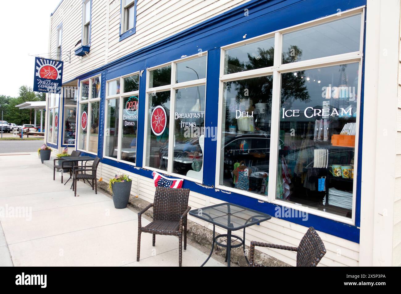 Entrance to The Williams Company Store and Deli with tables and chairs ...