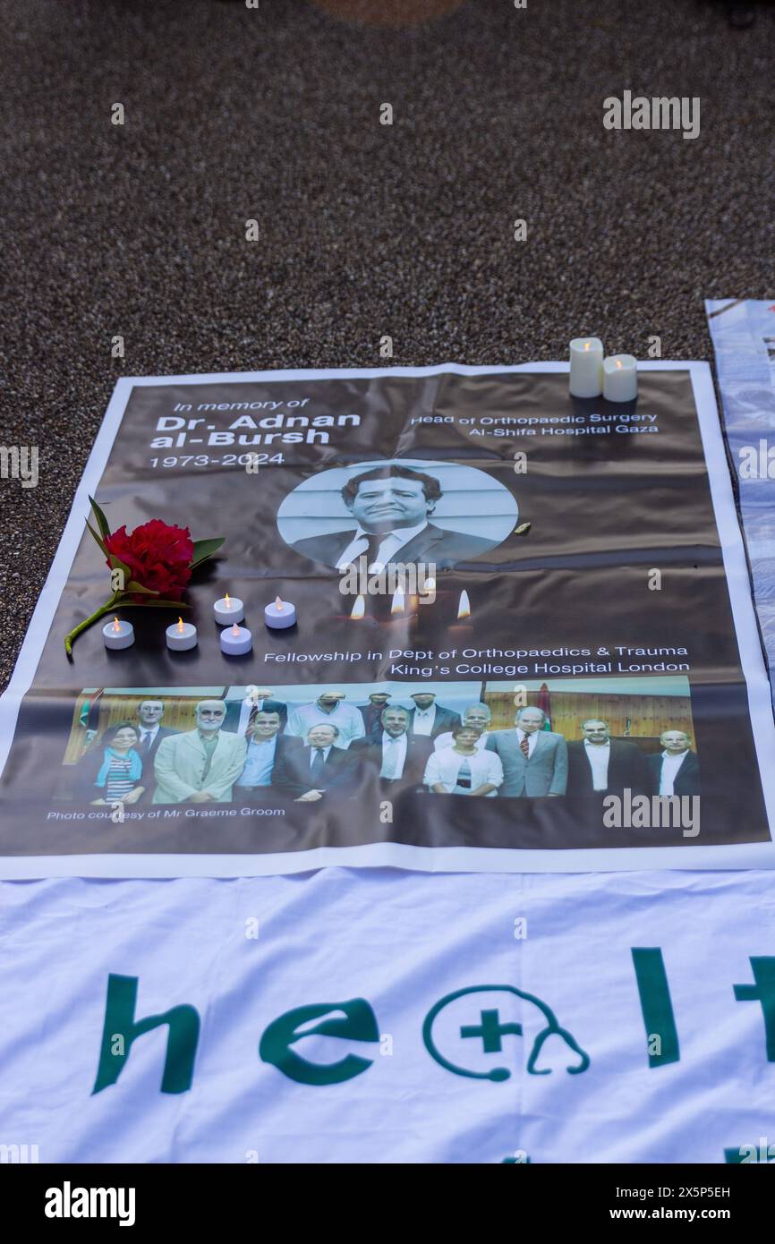 Healthcare workers attending a Vigil for Dr. Adnan al-Bursh who was ...