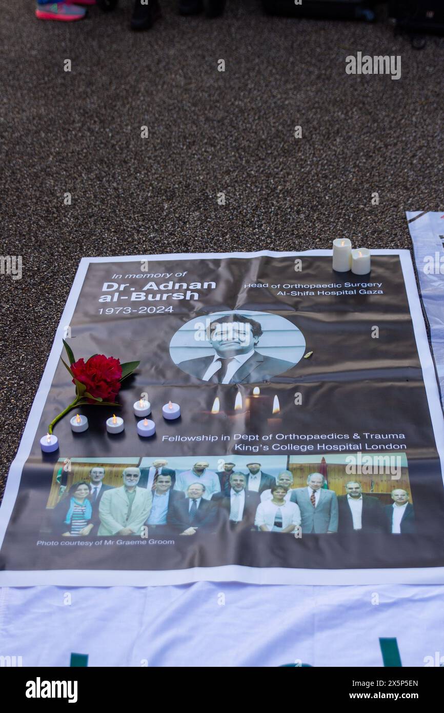 Healthcare workers attending a Vigil for Dr. Adnan al-Bursh who was ...