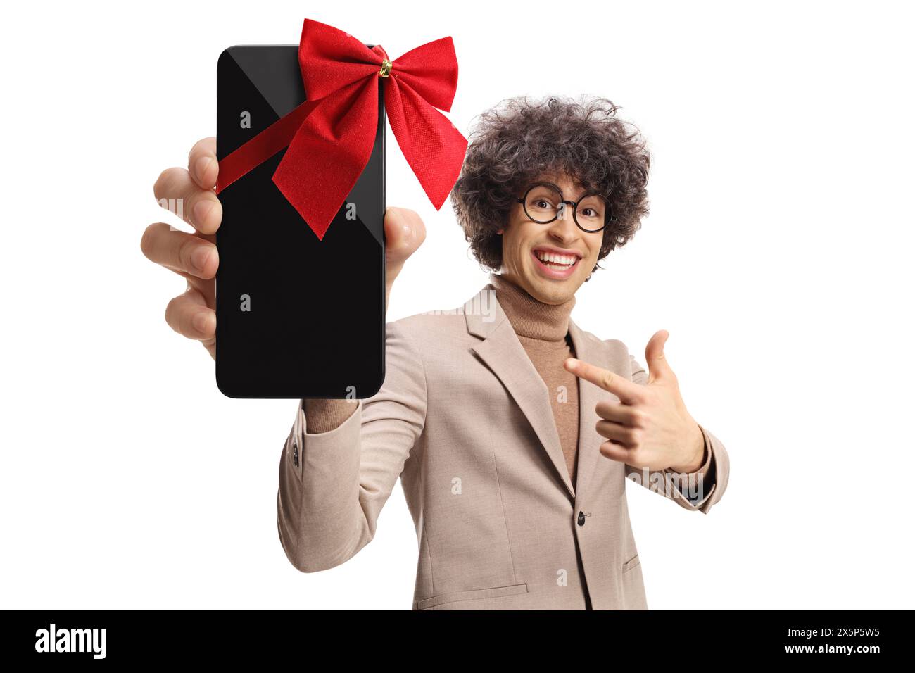 Happy young man winning a mobile phone tied with a red ribbon isolated ...