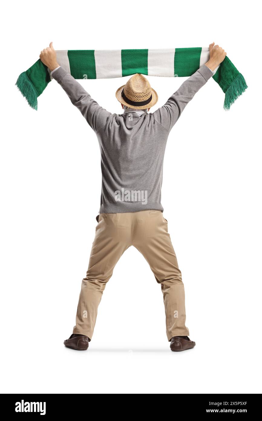 Rear view shot of a senior man cheering with a scarf isolated on white ...