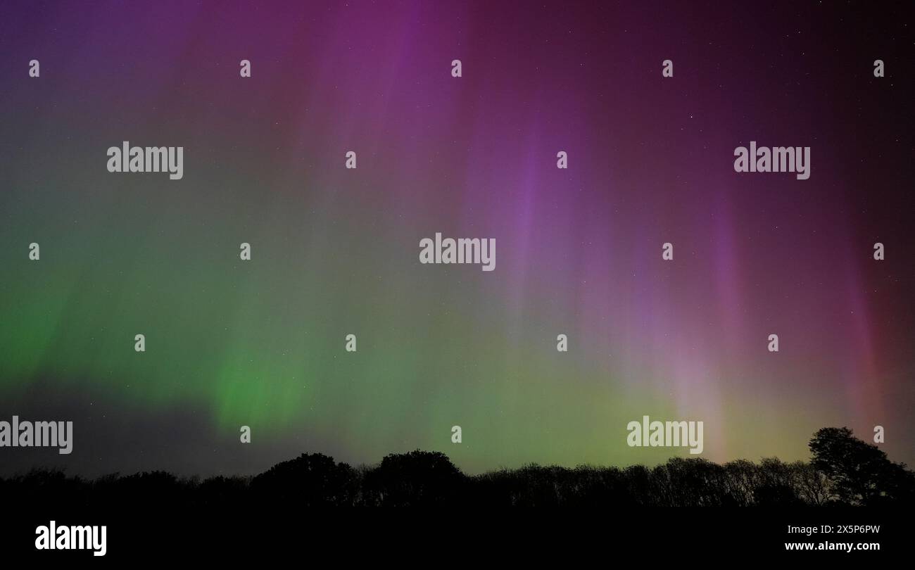 The aurora borealis, also known as the northern lights, glow on the ...