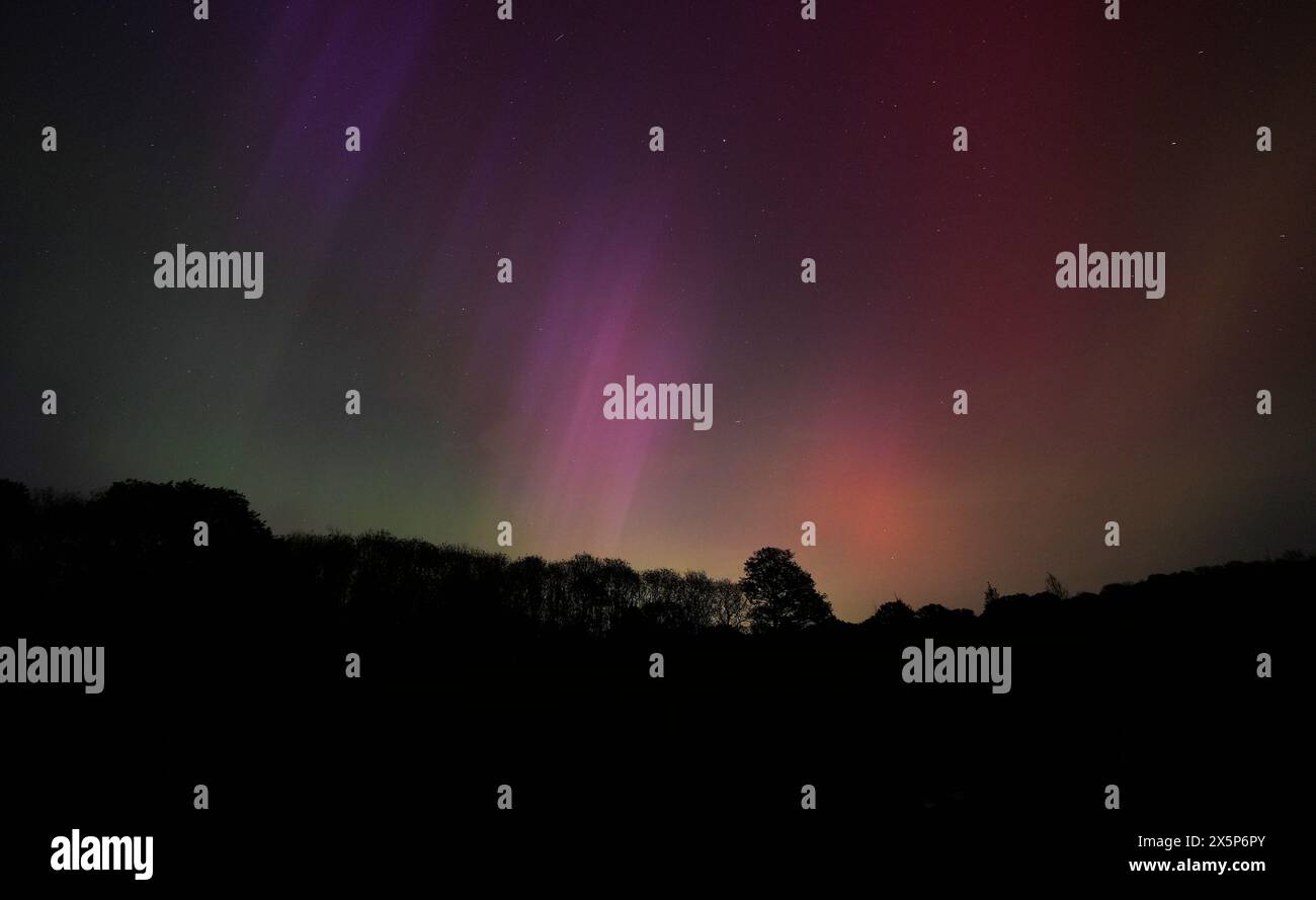 The aurora borealis, also known as the northern lights, glow on the ...