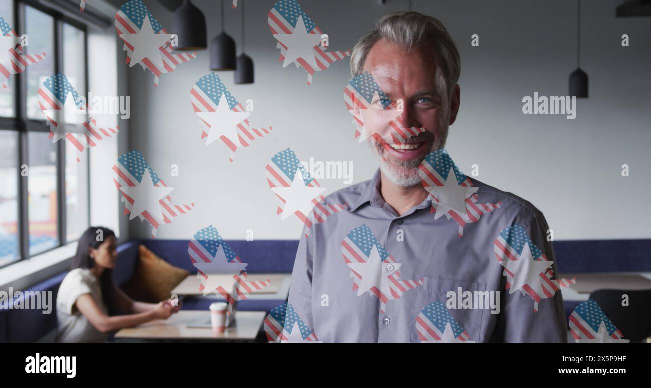A middle-aged Caucasian male senior manager/director standing, smiling ...