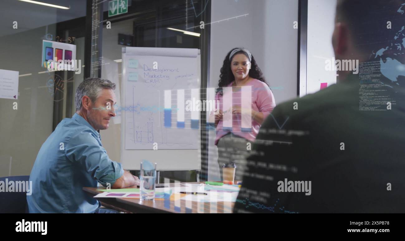 Image of graphs, globes, computer language over diverse coworkers ...