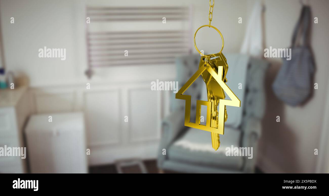 Golden house keys hanging against interior of modern living room in ...