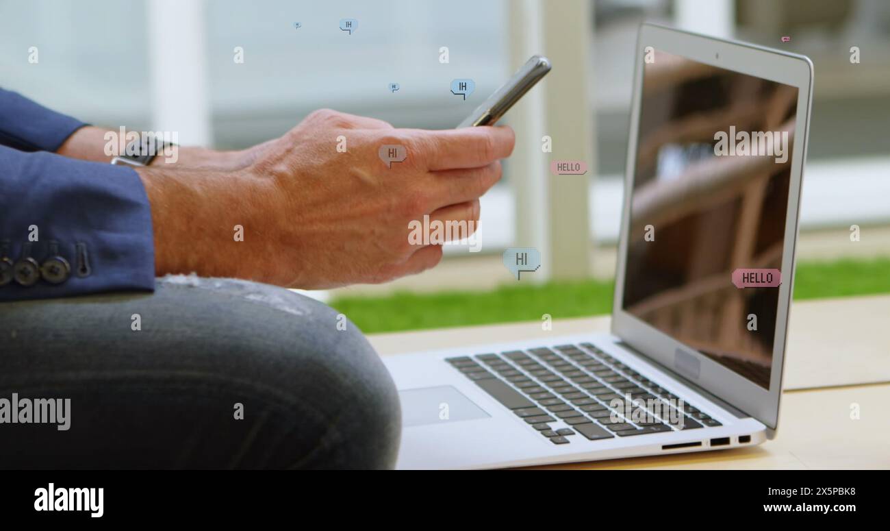 Images of falling social media icons over person using laptop Stock ...