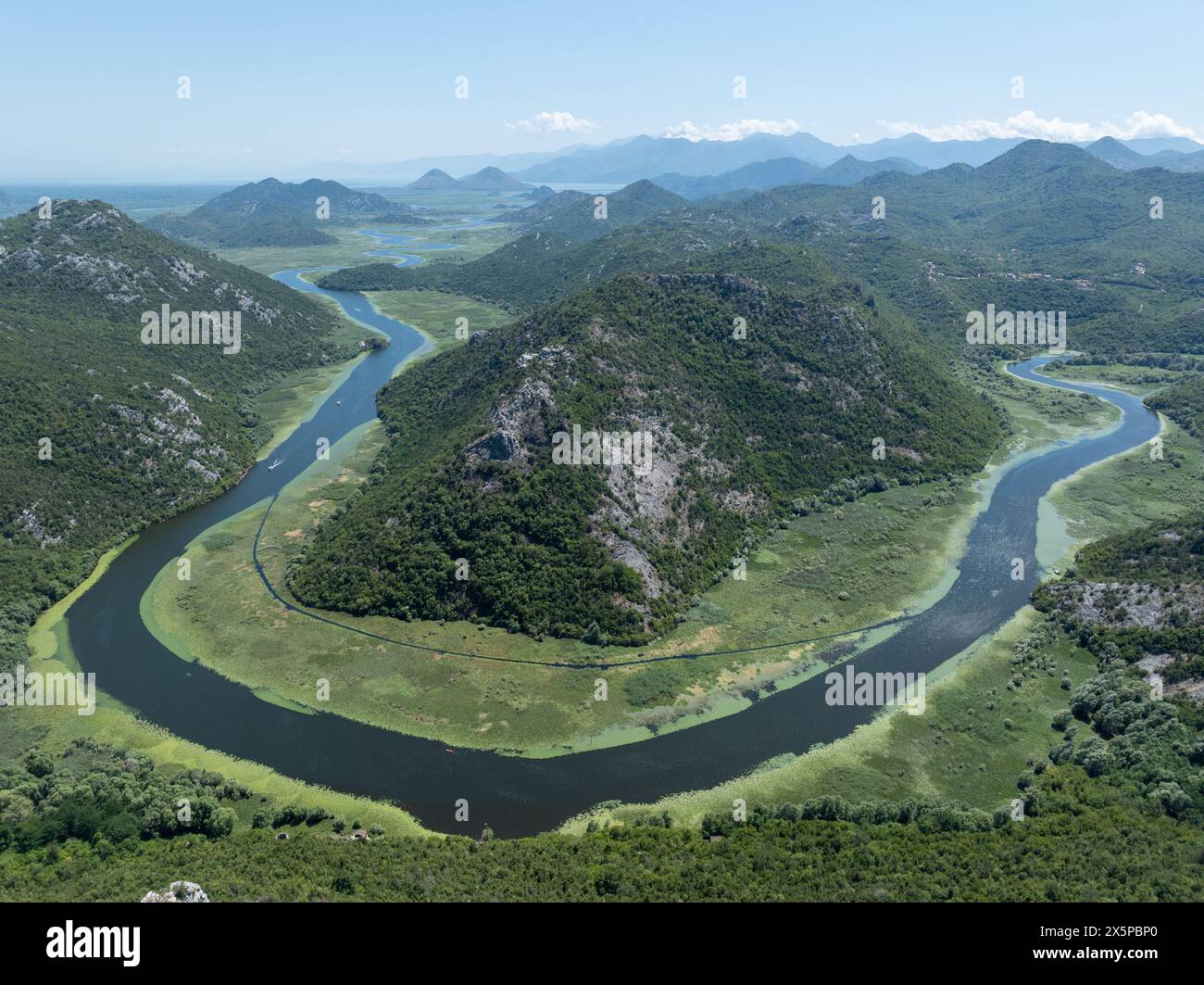 Pavlova strana viewpoint to the river bent and mountains, skadar lake national park, Montenegro ...