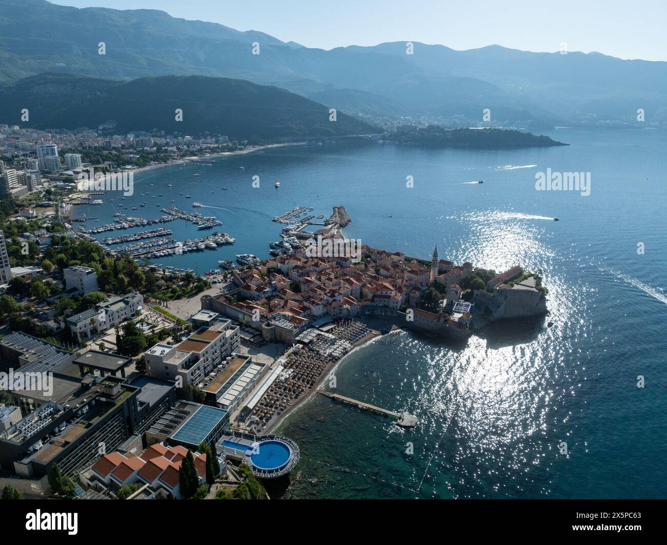 Aerial view of the old town in Budva in a beautiful summer day ...