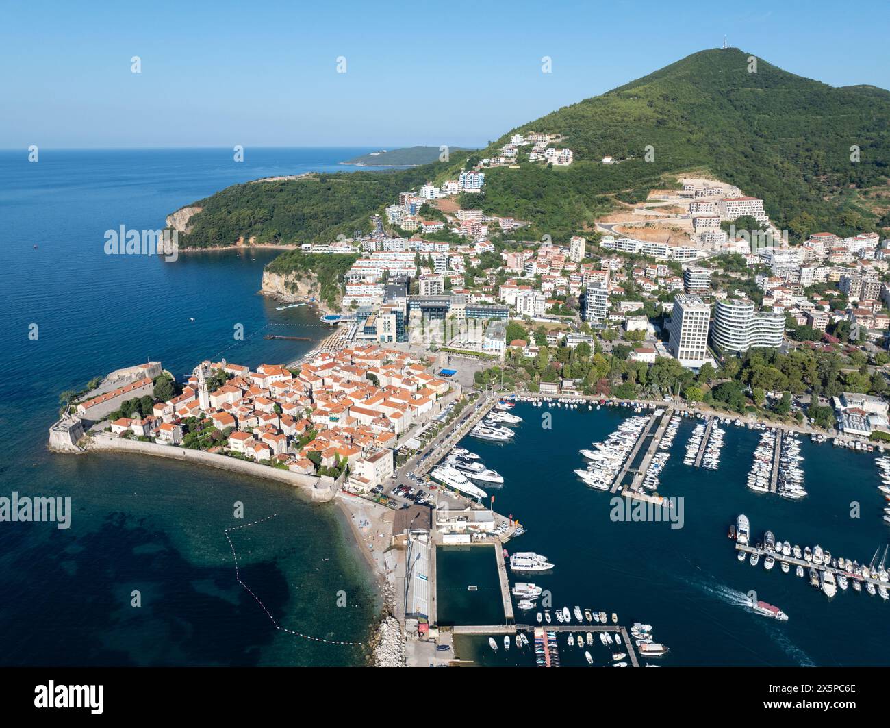 Aerial view of the old town in Budva in a beautiful summer day ...