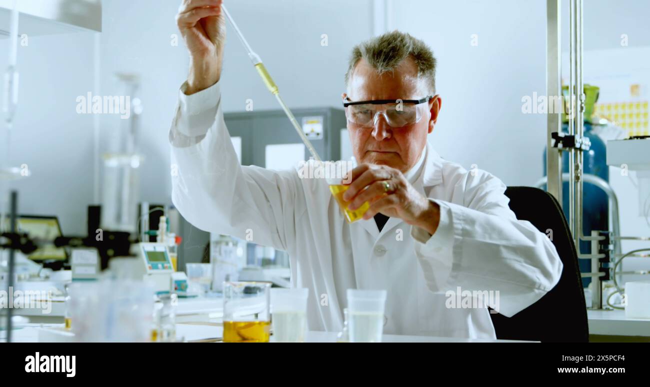 Image of shapes over caucasian male scientist in lab Stock Photo - Alamy