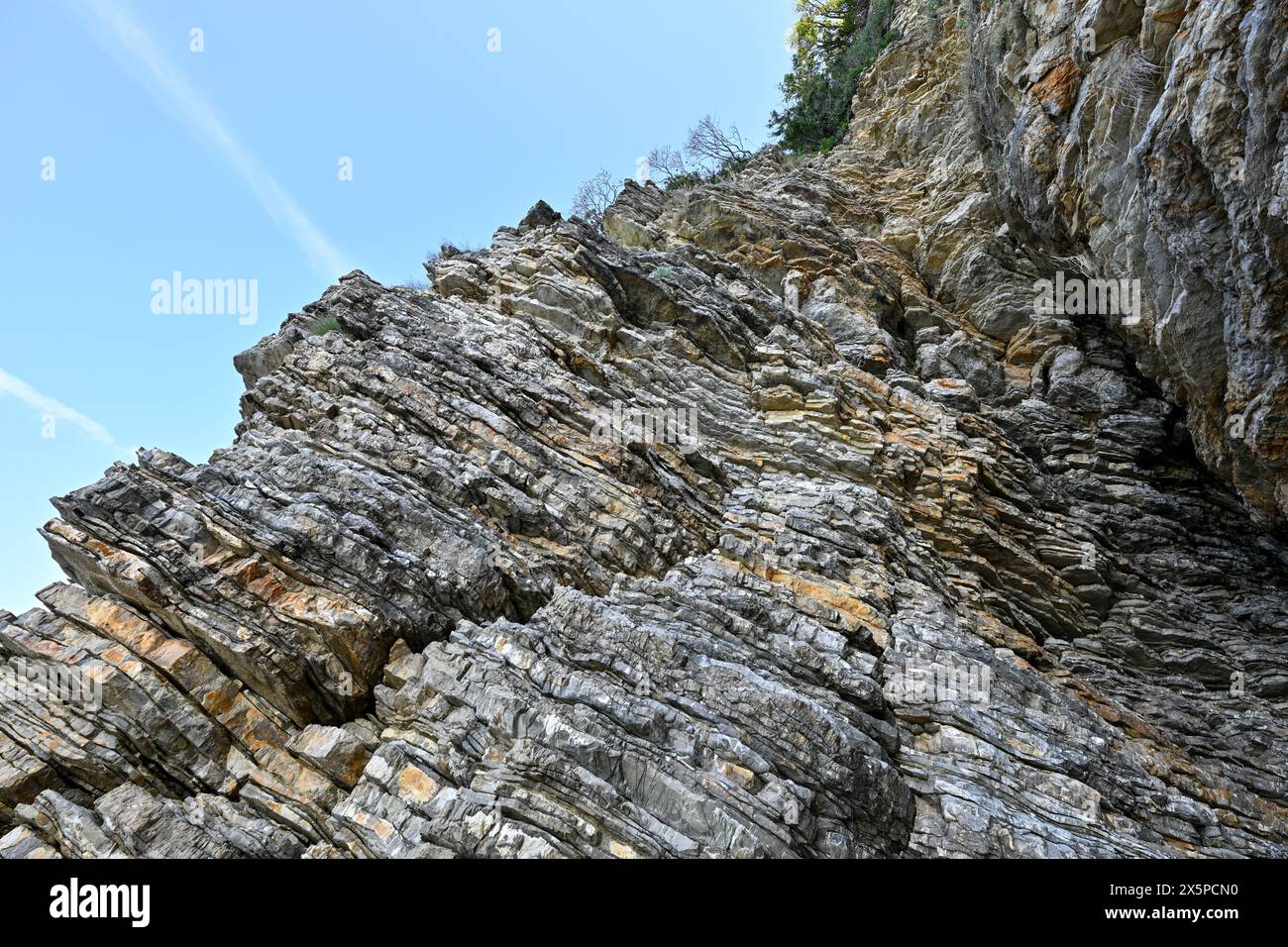 Texture of layered mineral formations on a rock in Budva, Montenegro ...