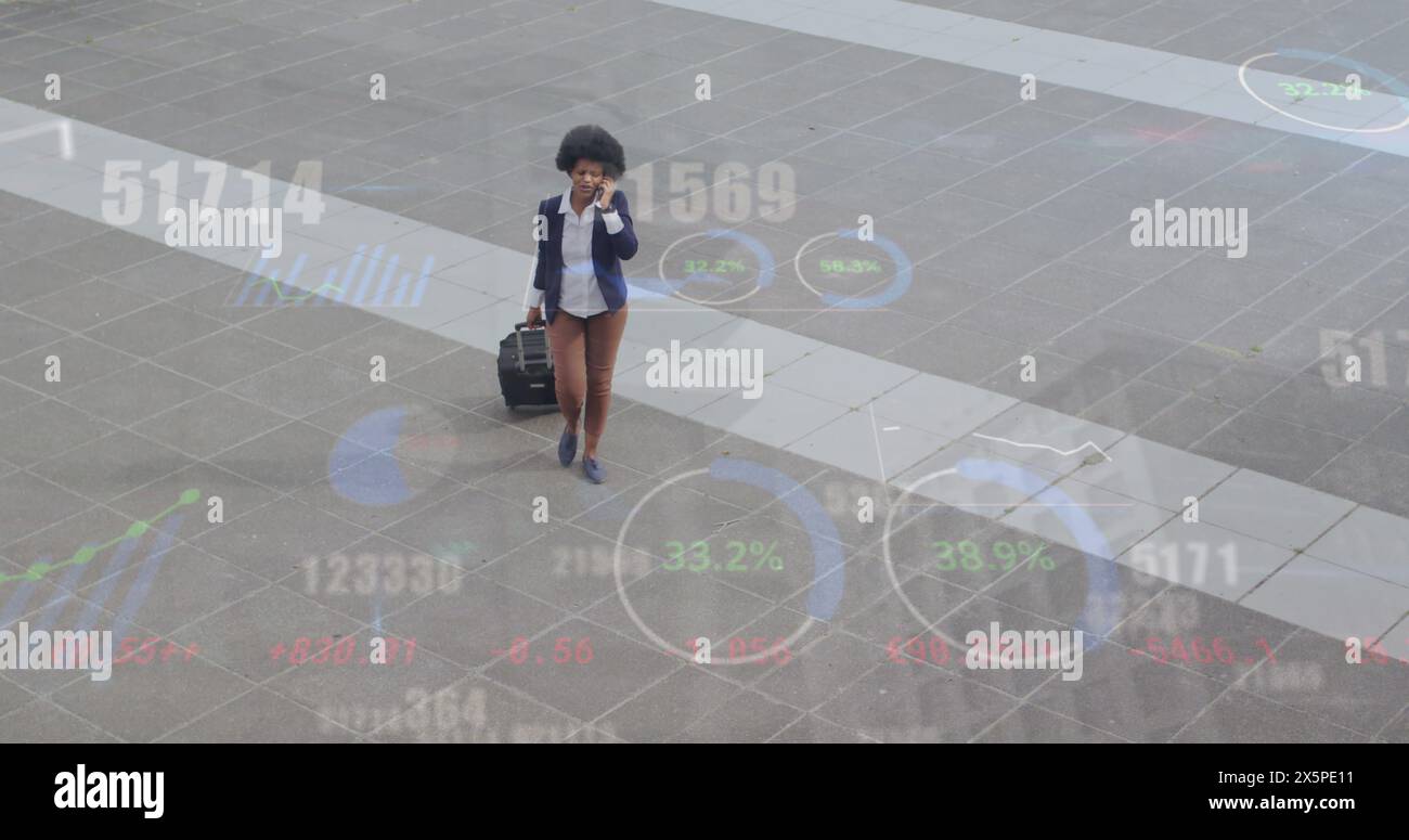 Image of numbers, circles, graphs over african american woman talking ...