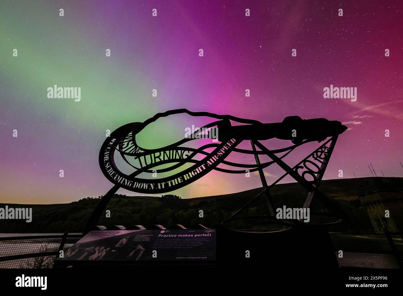 Northern Lights shine through the RAF 617 Dambuster Squadron Memorial ...