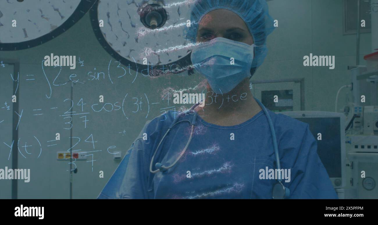 Image of brain rotating over caucasian female surgeon in face mask ...