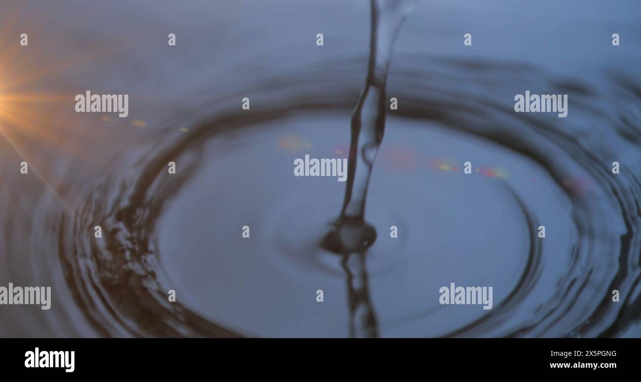 Image of light spots over water drop Stock Photo - Alamy