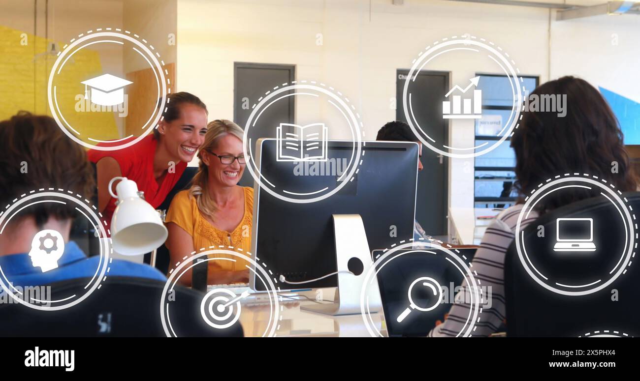 Image of icons over happy caucasian female coworkers looking into ...