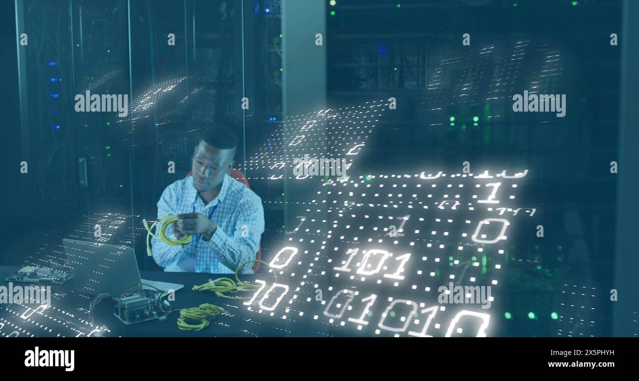 Image of binary codes, african american man feeding cable details in ...