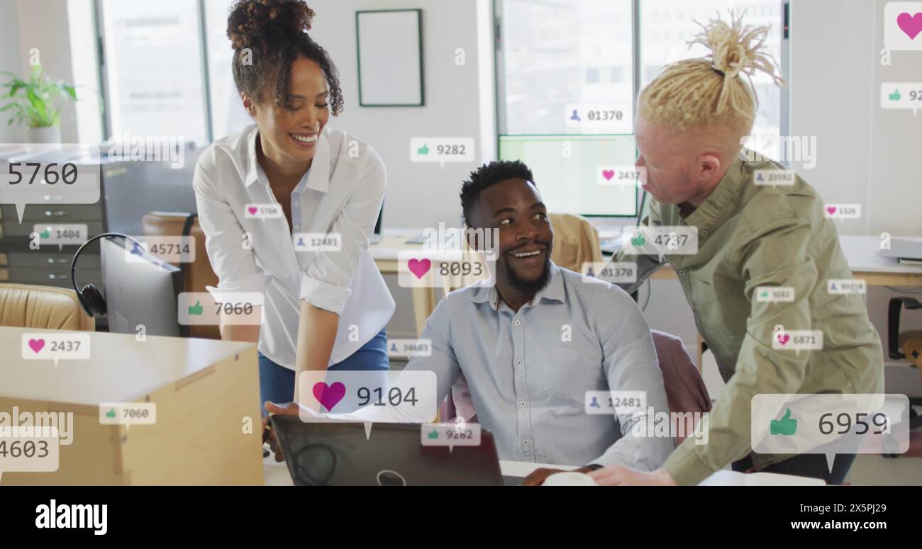 Anmation of social media icons against diverse colleagues discussing ...