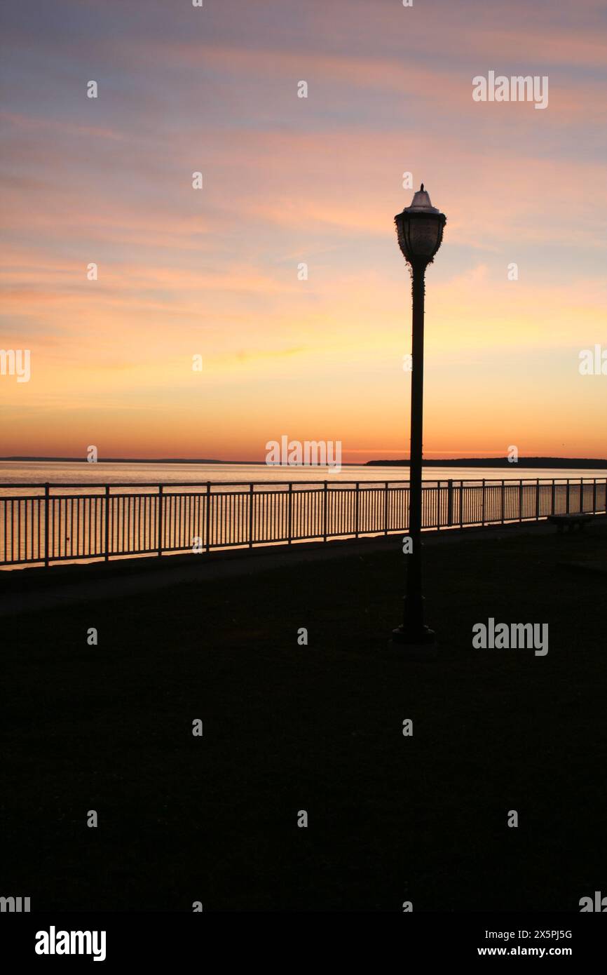 Early Morning Sunrise Over Looking the Water Stock Photo - Alamy