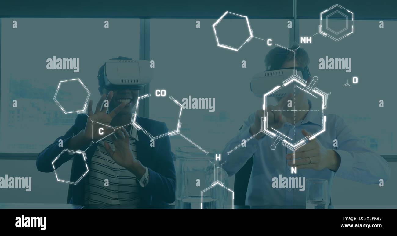 Image of chemical formulas over two diverse people using vr headsets ...