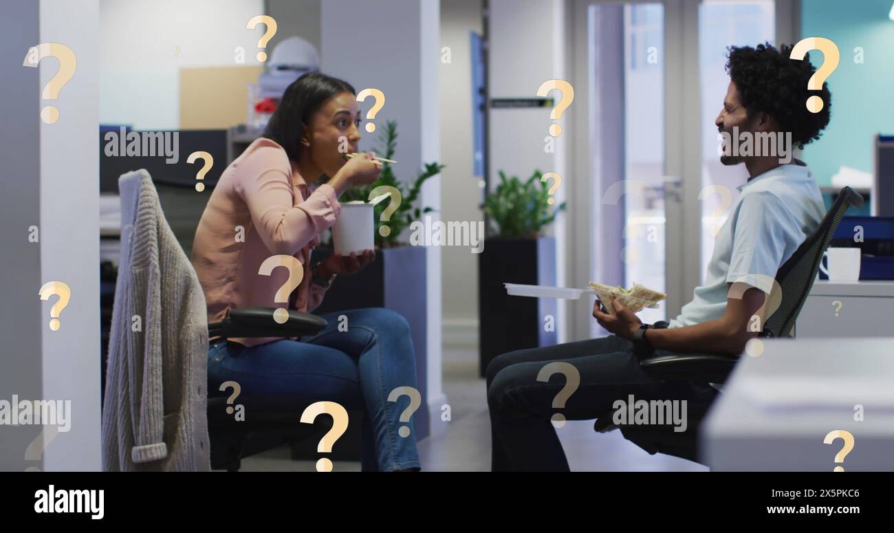 Image of question marks over african american coworkers talking while ...