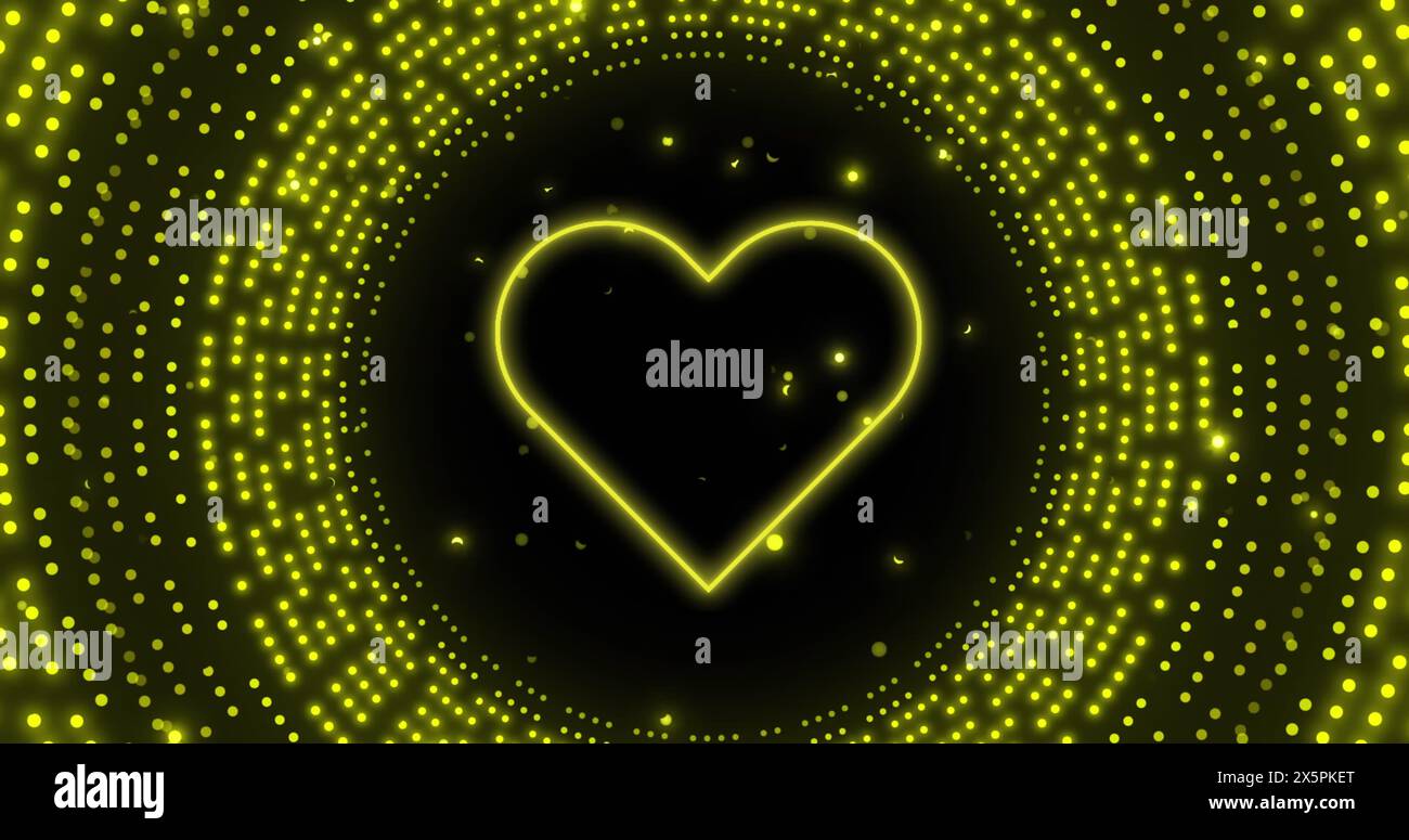 Image of neon heart over flashing yellow light pattern Stock Photo - Alamy