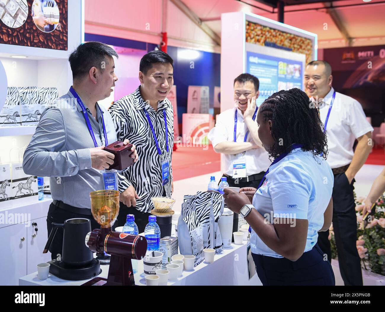 Beijing, Kenya. 9th May, 2024. A coffee exhibitor shows coffee products during the China-Africa ...