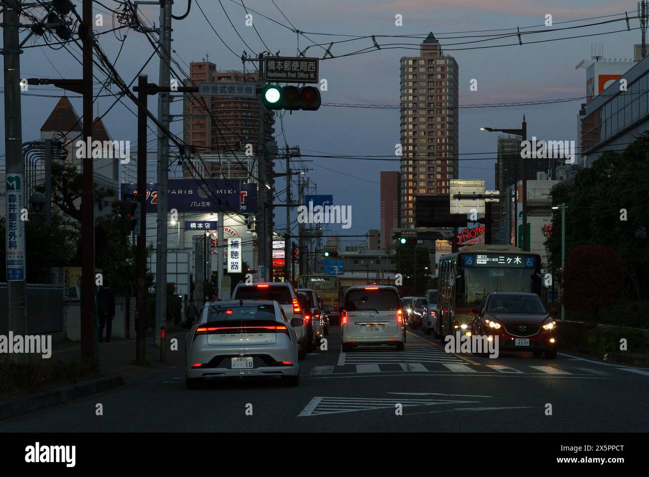 Traffic on a road in Hashimoto at dusk, Kanagawa, Japan Stock Photo - Alamy