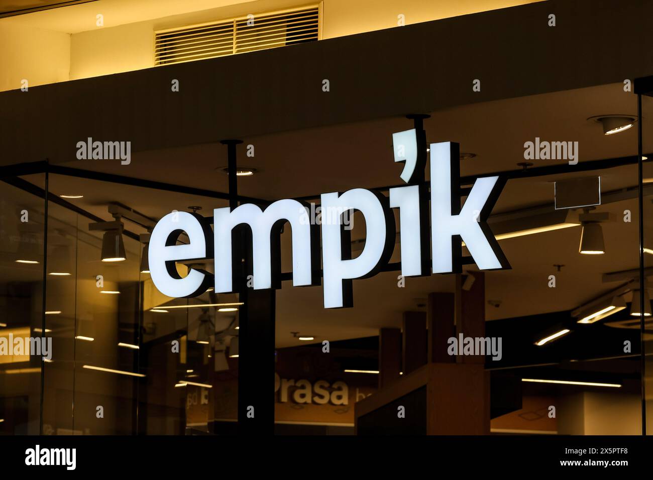 The Empik logo is seen on a shop window on a high street in Warsaw. The ...