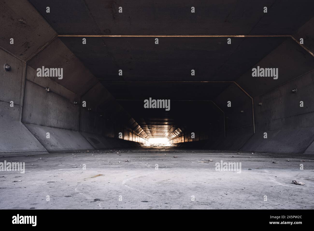 Focus stacked image inside a concrete box culvert under a road for ...